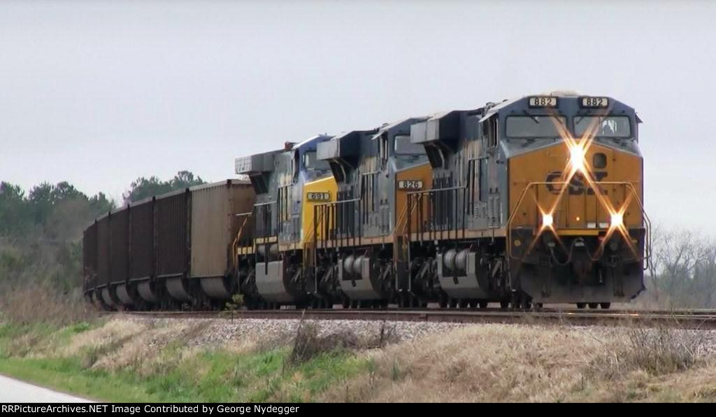 CSX 882 (ES44AC) leading a returning empty coal train